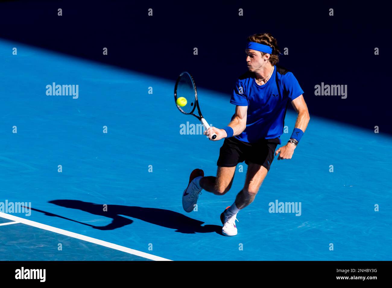 MELBOURNE, VIC - JANUARY 23: Andrey Rublev of Russia in action during ...