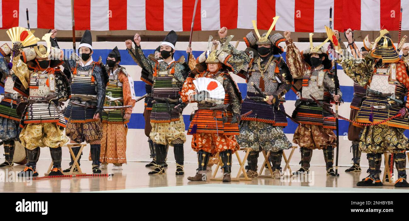 Participants clad in samurai armor shout a battle cry during an annual ...