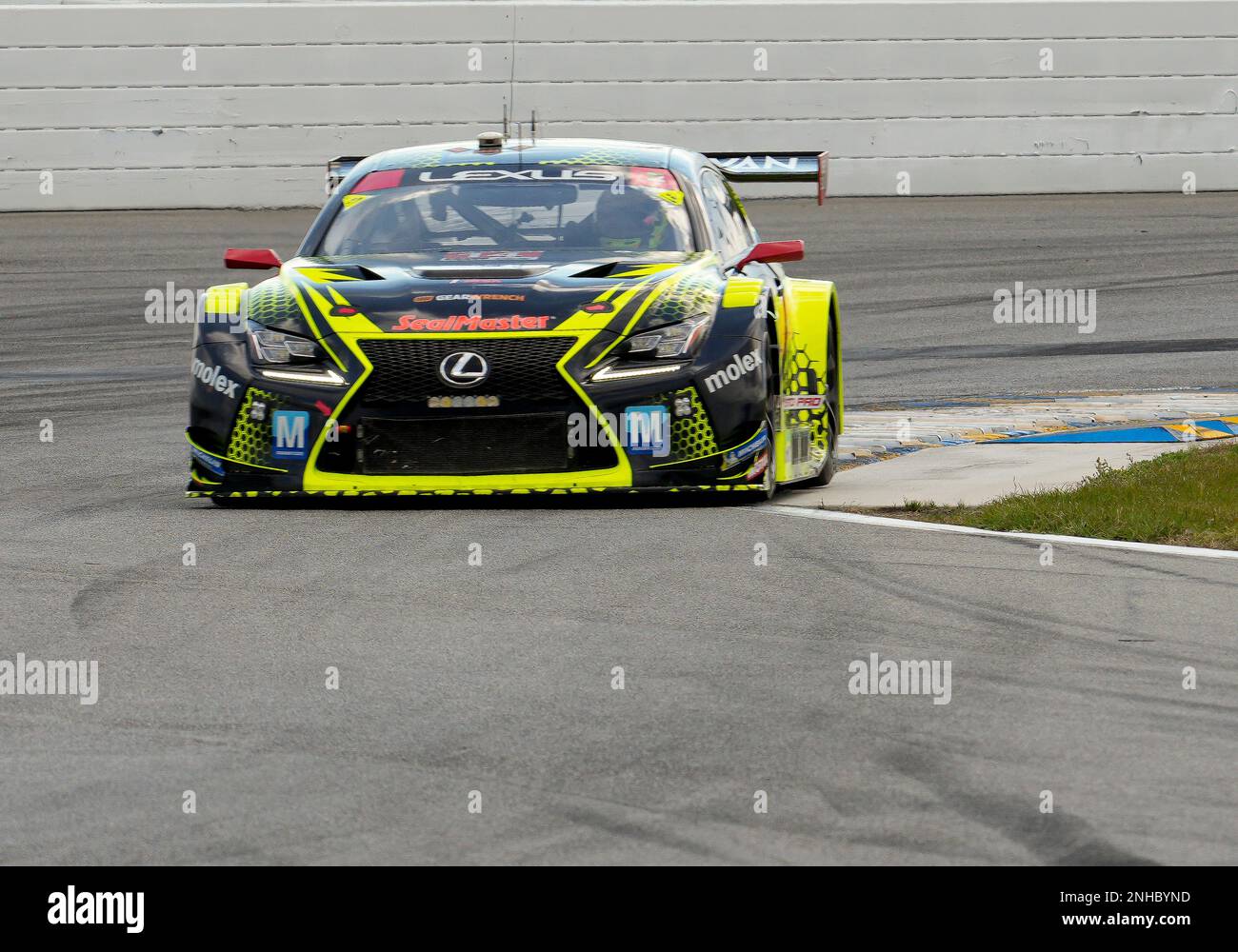 DAYTONA, FL - JANUARY 22:Vasser Sullivan driver Ben Barnicoat , & Jack ...