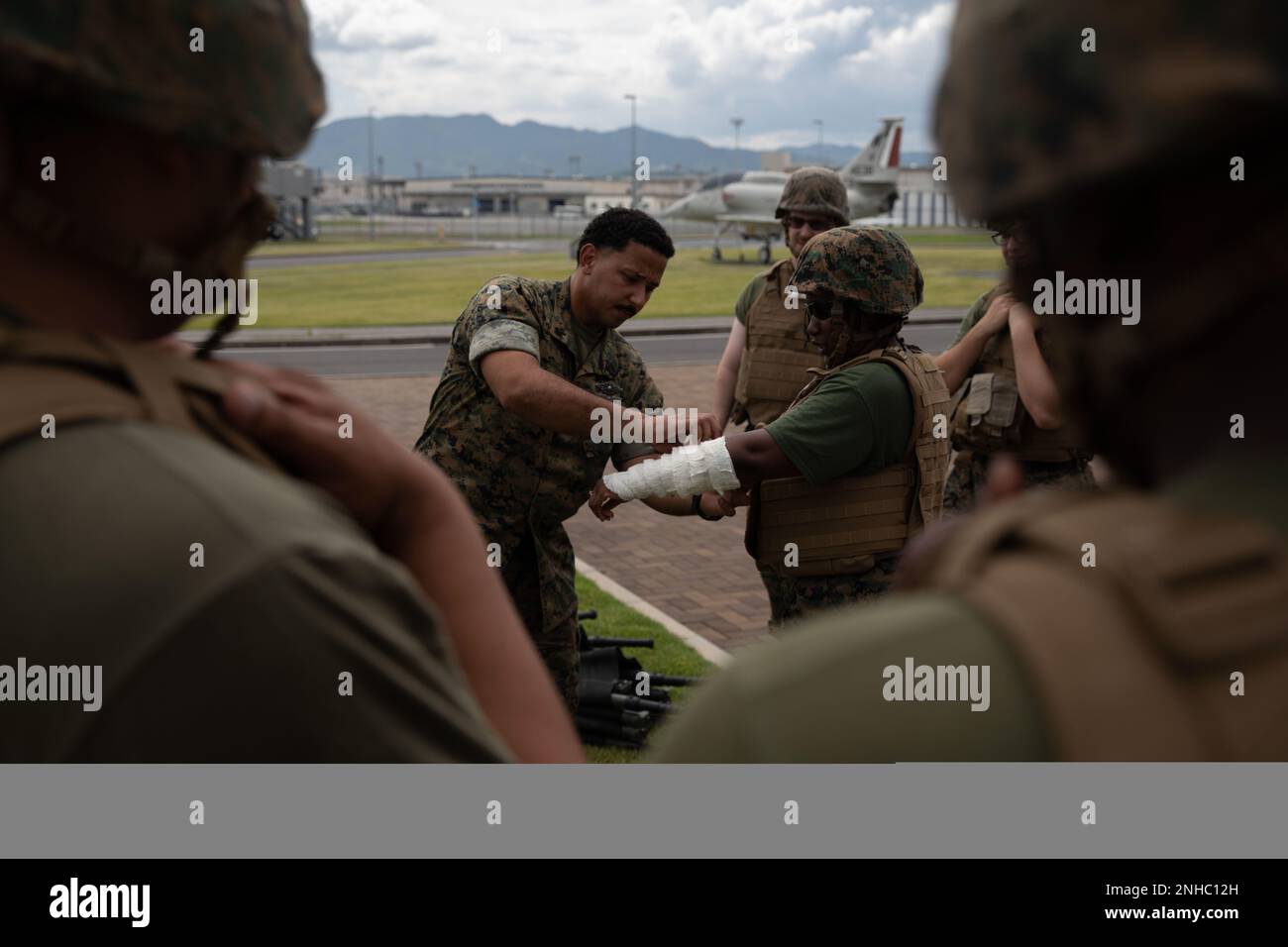U.S. Navy Sailors with Marine Aircraft Group (MAG) 12 observe a ...
