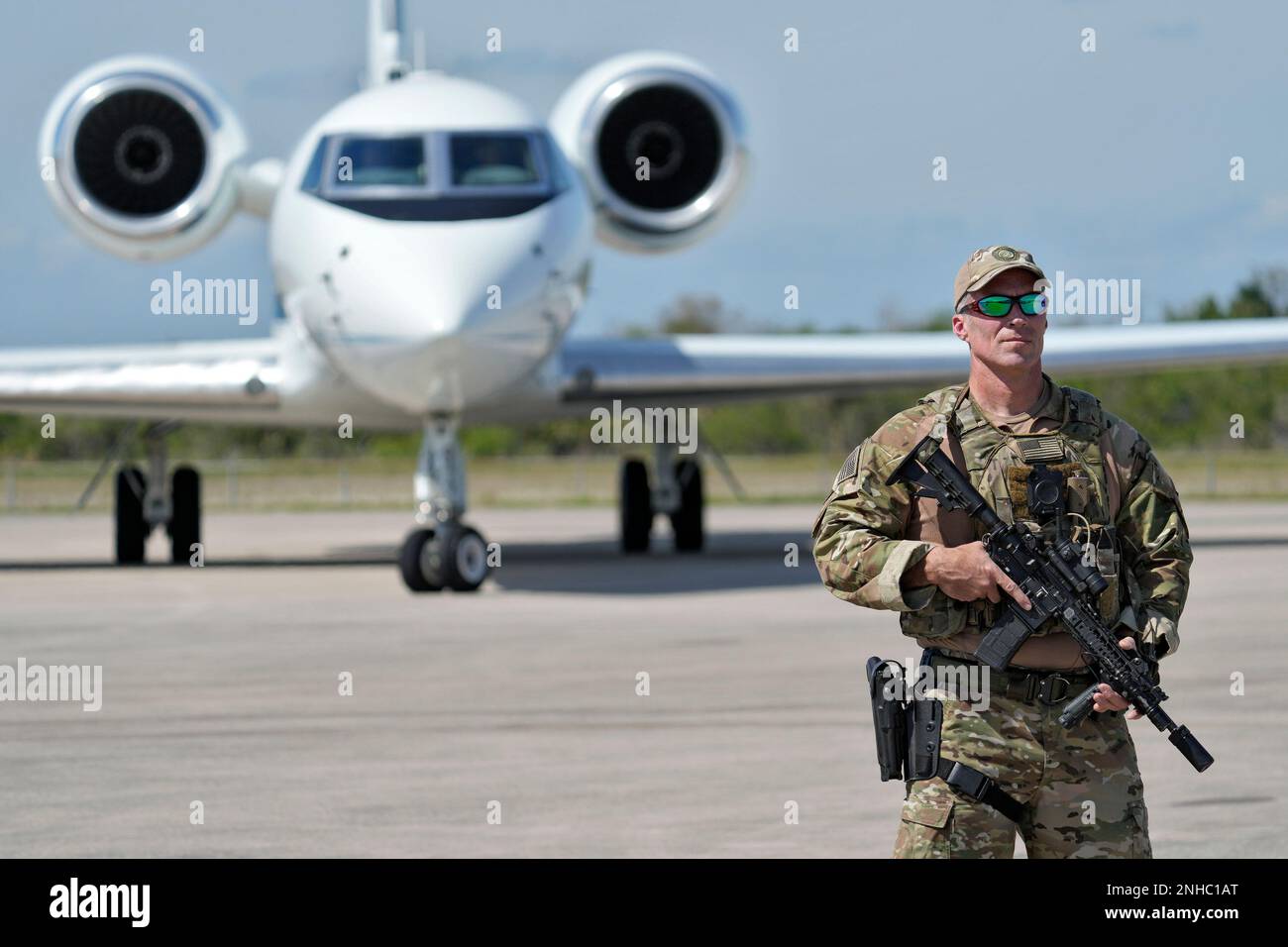 A Kennedy Space Center SWAT team member stands guard as the SpaceX Crew ...