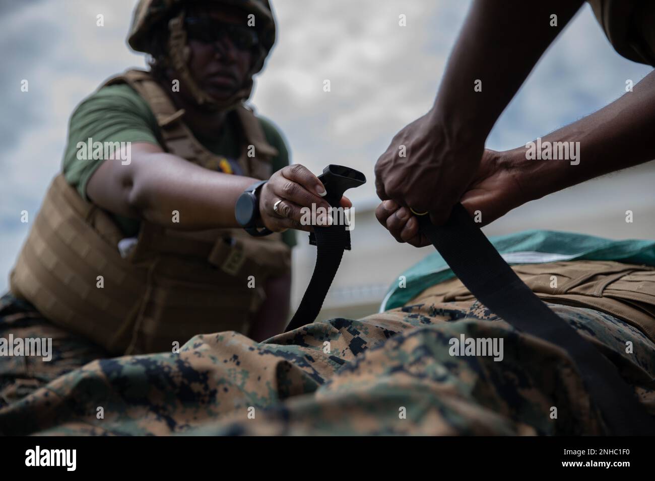 U.S. Navy Hospital Corpsman 1st Class Erica Toussaint of Marine ...