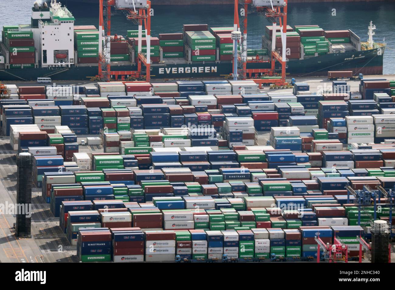 An aerial photo shows containers piled up at a container terminal at ...