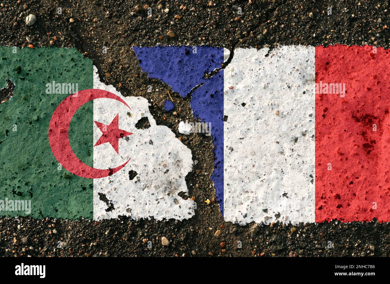 On the pavement there are images of the flags of Algeria and France, as ...