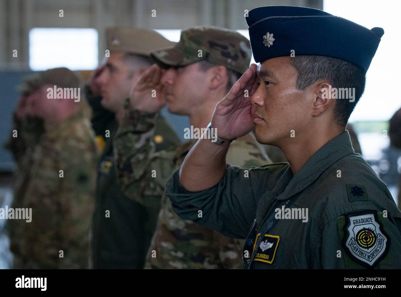 Lt. Col. Chad Nishizuka, 16th Electronic Warfare Squadron, salutes ...