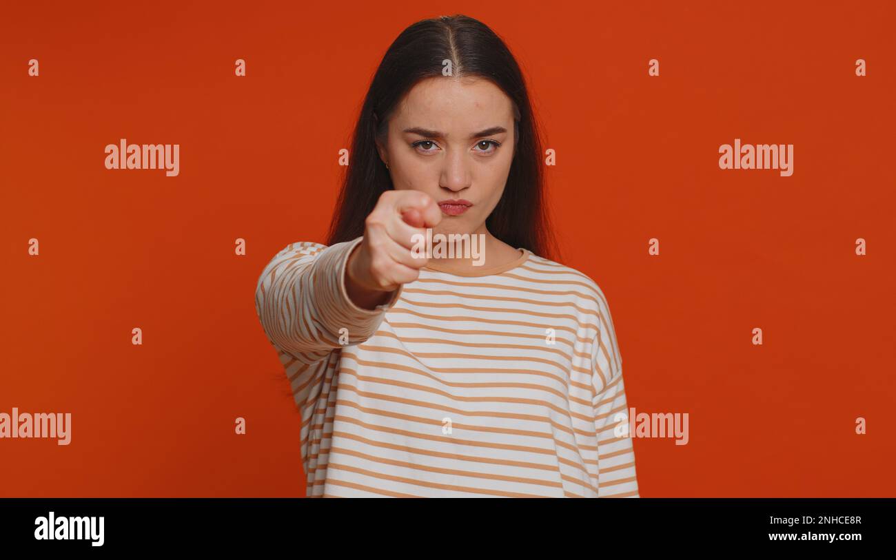 Angry aggressive pretty woman showing fig negative gesture, you dont ...