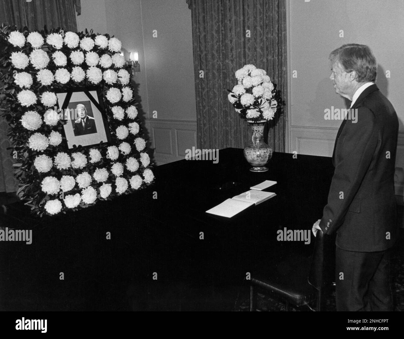 United States President Jimmy Carter pays his respects on the occasion ...
