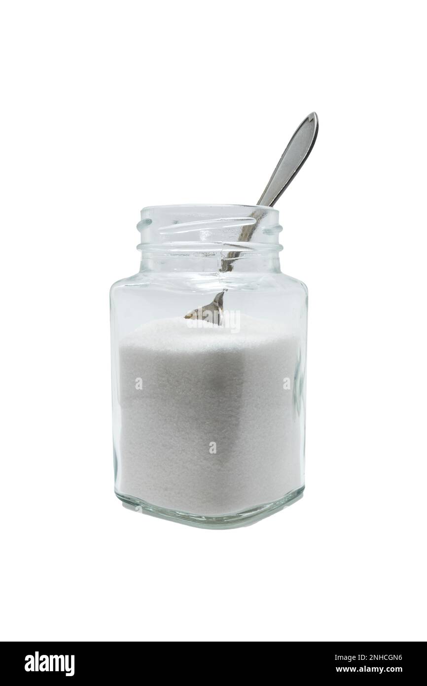 Salt in a glass jar with the spoon. Isolated on white with clipping ...