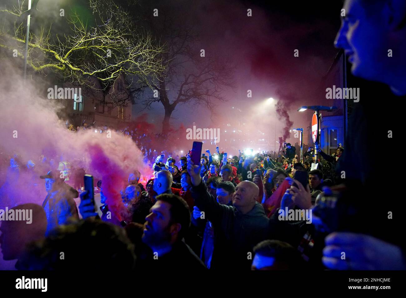 Fans set off smoke flares ahead of the Champions League round of 16 ...