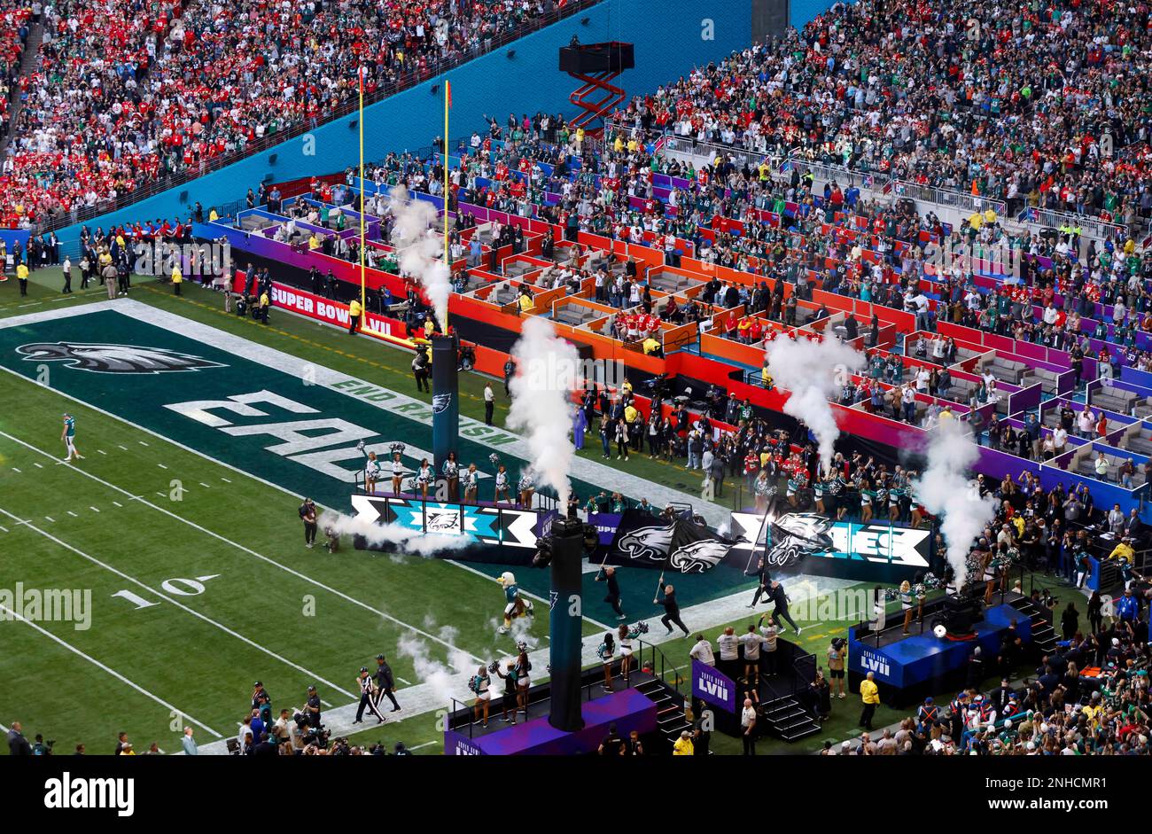 Philadelphia Eagles run onto the field before Super Bowl LVII between ...