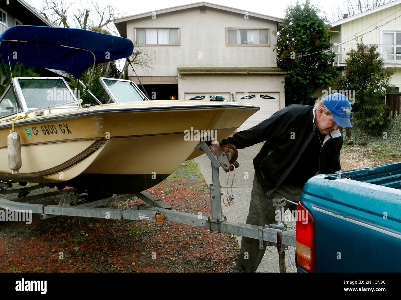 Michael Boyter of Bethel Island, Ca. moves his boat to a next door ...