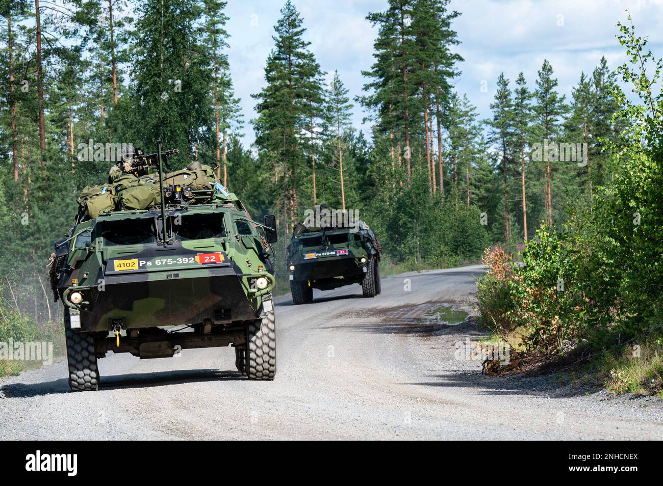 Finnish soldiers with the Pori Brigade readiness unit maneuver in Sisu ...