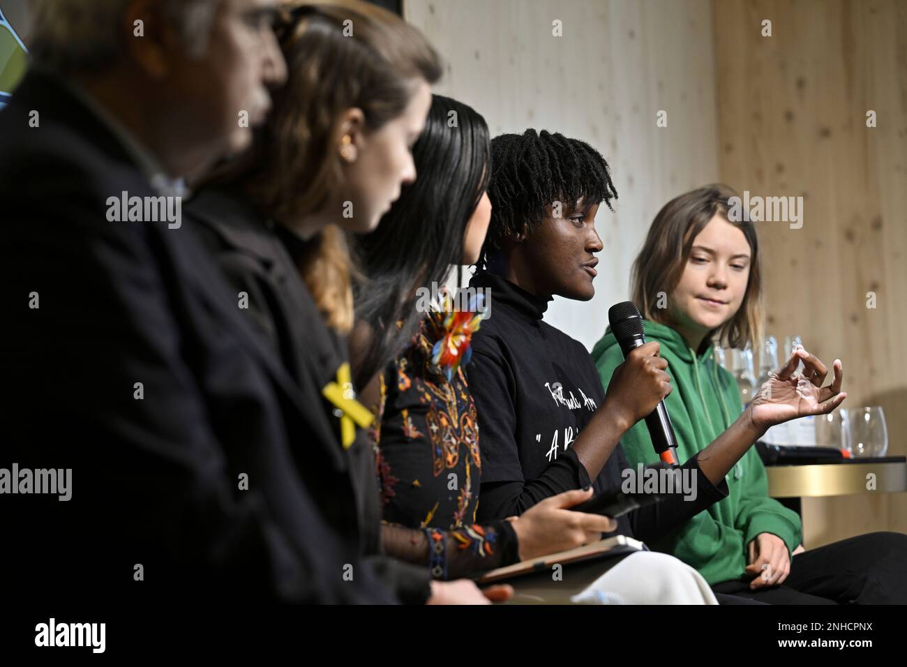 Climate activist Vanessa Nakate of Uganda, second right, speaks next to ...