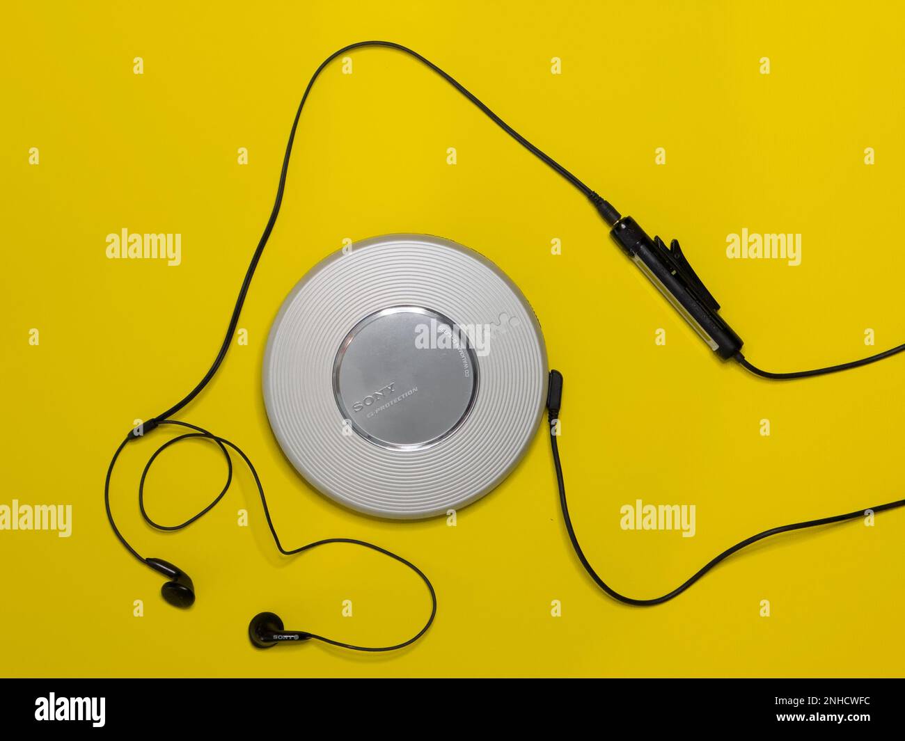 an amazing photograph of Sony Diskman, on a yellow background, top view ...