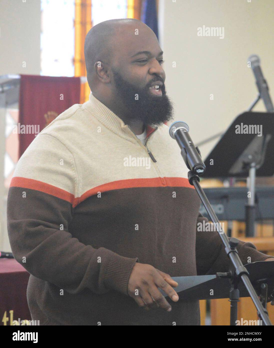 Rev. James Stewart gave a sermon before the panelists spoke during the ...