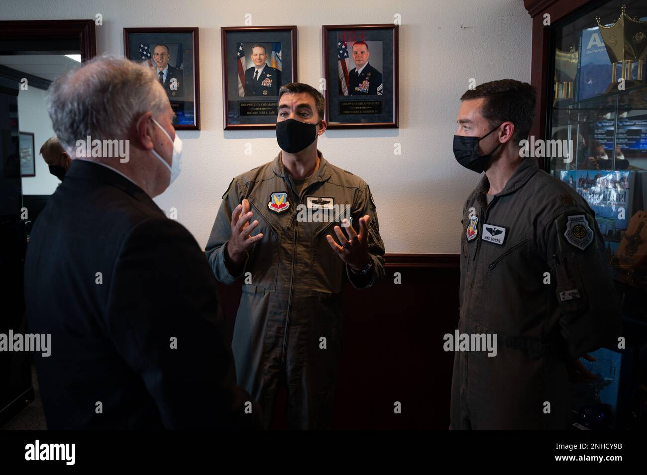 Brig. Gen. Richard Goodman, 57th Wing commander, relays the ...