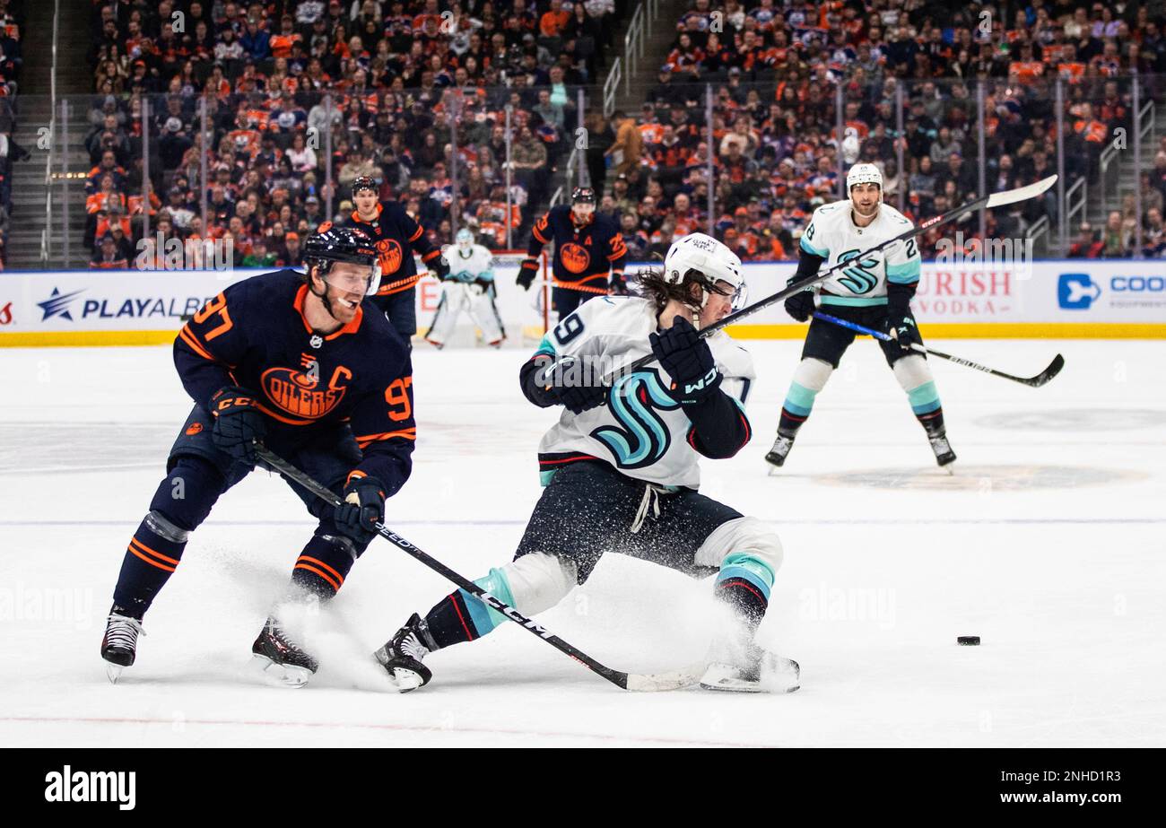 Seattle Kraken's Jared McCann (19) and Edmonton Oilers' Connor McDavid ...