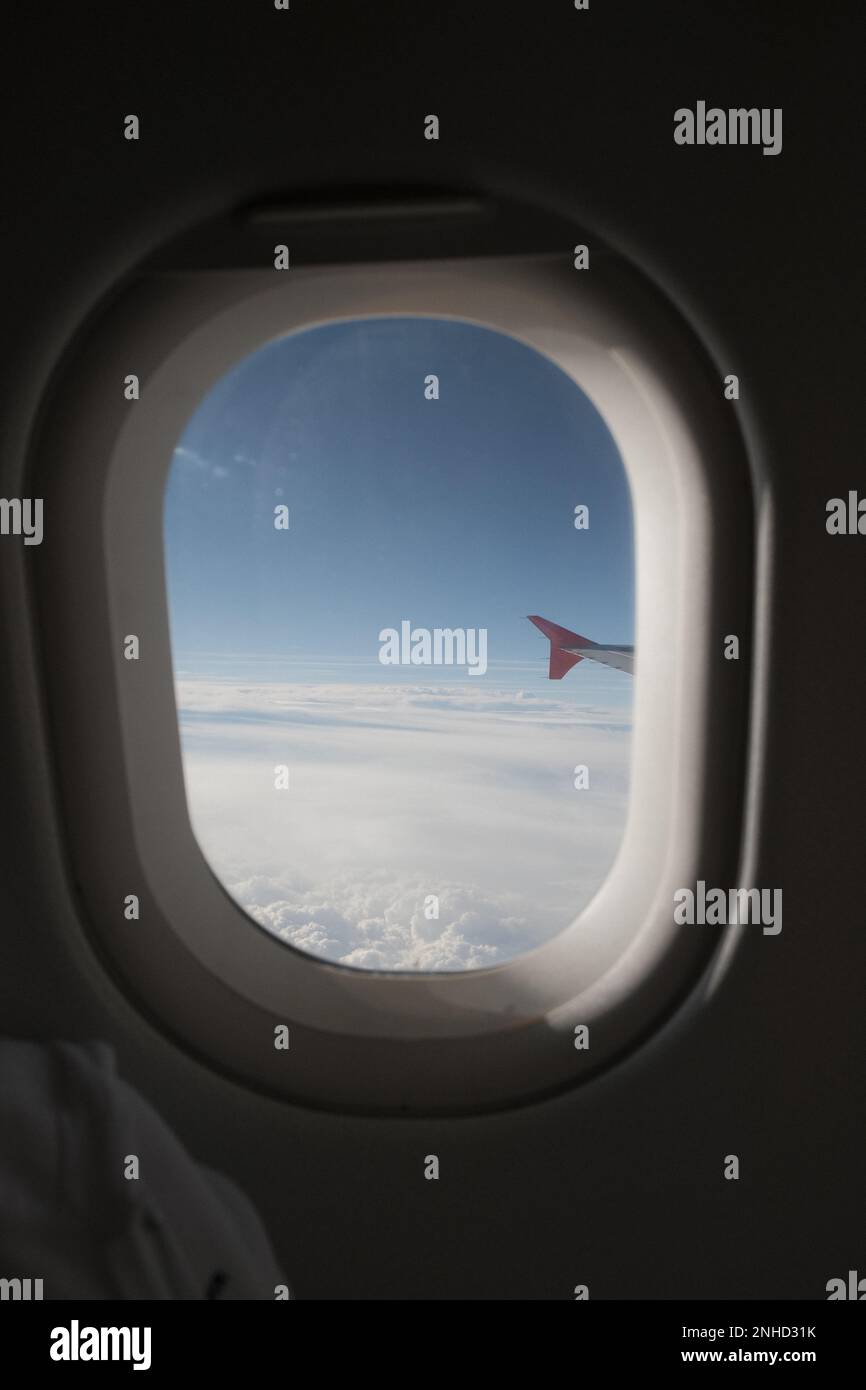 view out of a plane with blue sky Stock Photo - Alamy