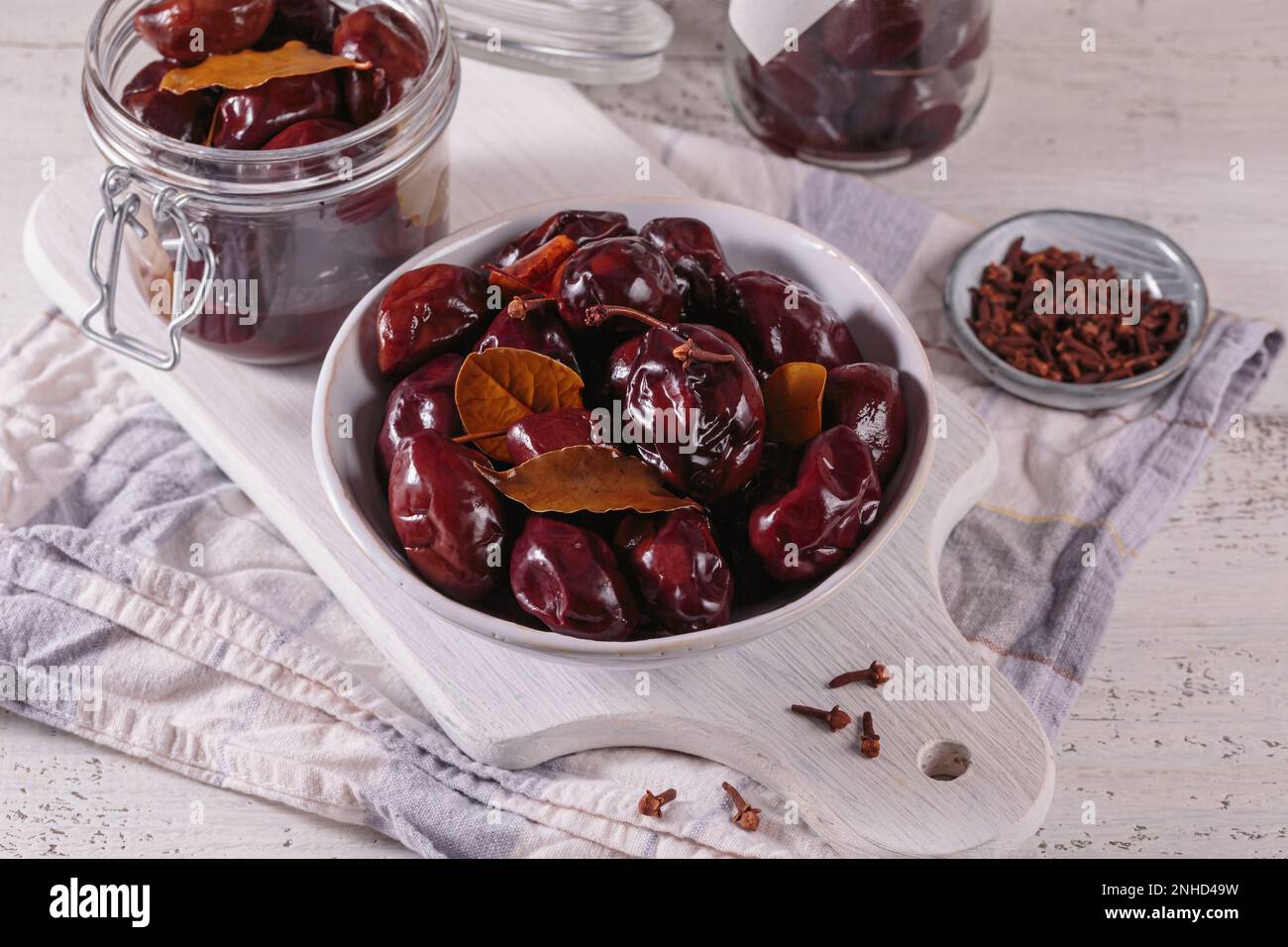 Preserving pickled plums and seasonings Stock Photo - Alamy