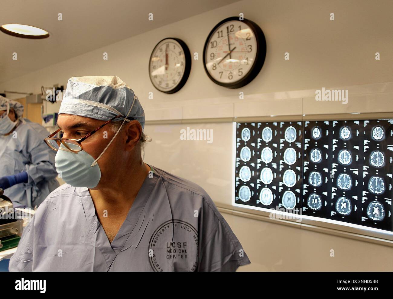 Dr. Mitchel Berger had one last look at the images of the patients ...