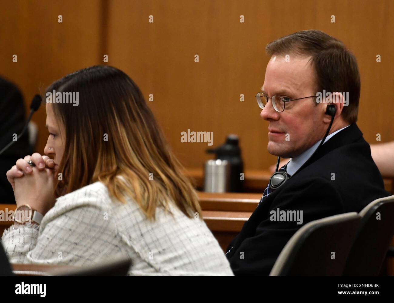 Mark Jensen, right, sits with one of his attorneys, Mackenzie Renner ...