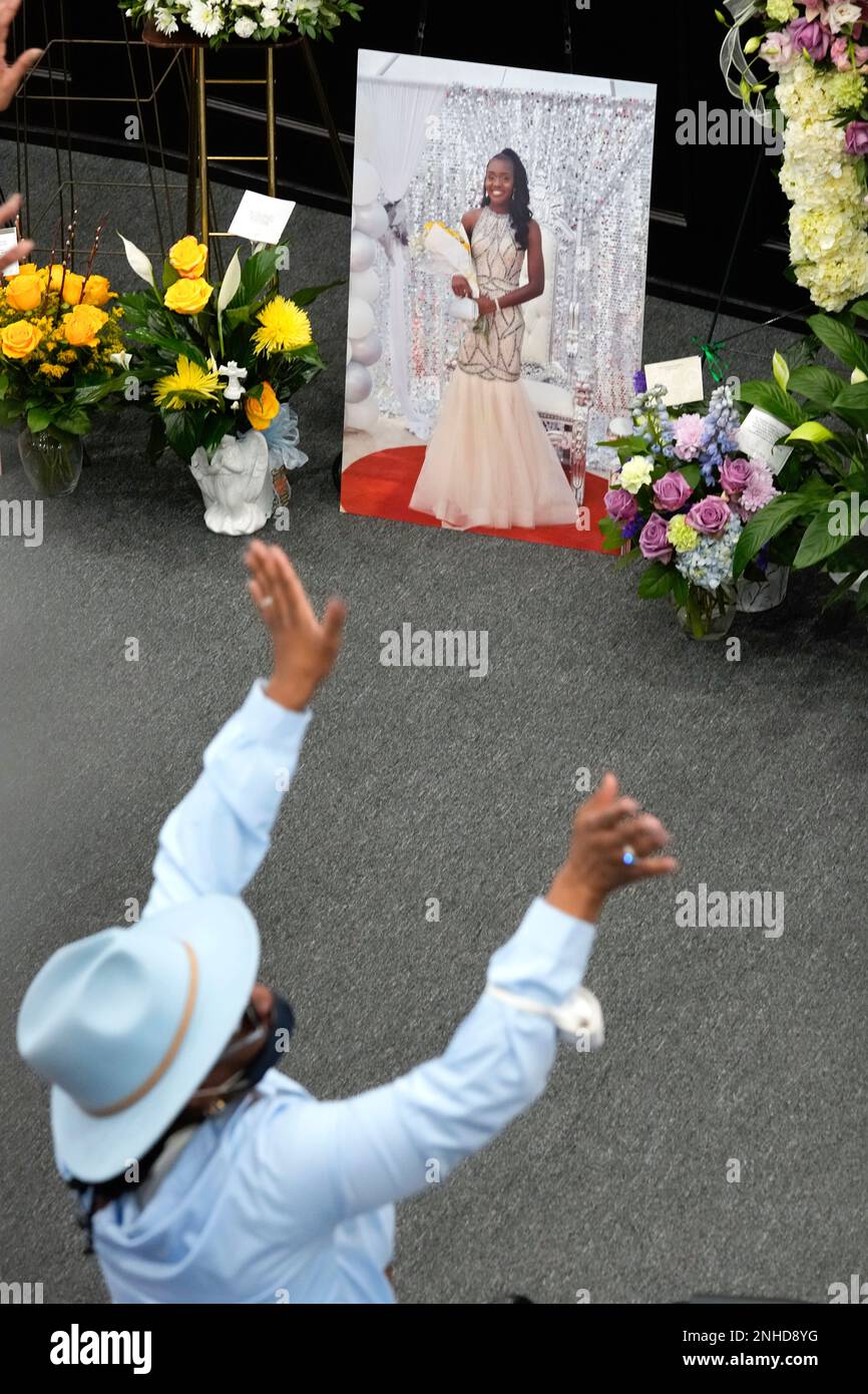 A mourner attends the funeral for Michigan State University shooting ...