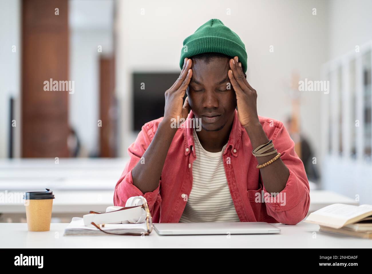 Exhausted black student man suffering from anxiety or panic attack ...