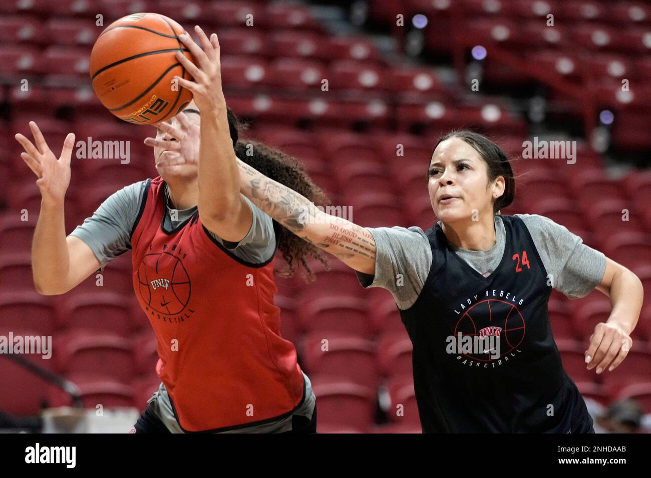 UNLV guard Essence Booker, right, tries to steal the ball from center ...