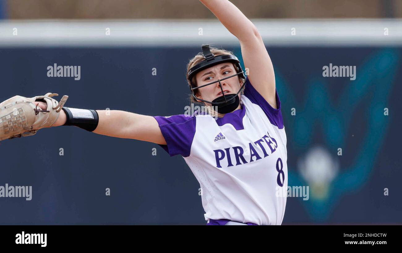 East Carolina's Jordan Hatch (8) pitches during an NCAA softball game ...