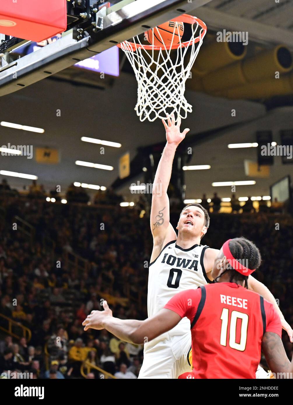 IOWA CITY, IA - JANUARY 15: Iowa forward Filip Rebraca (0) sinks a shot ...