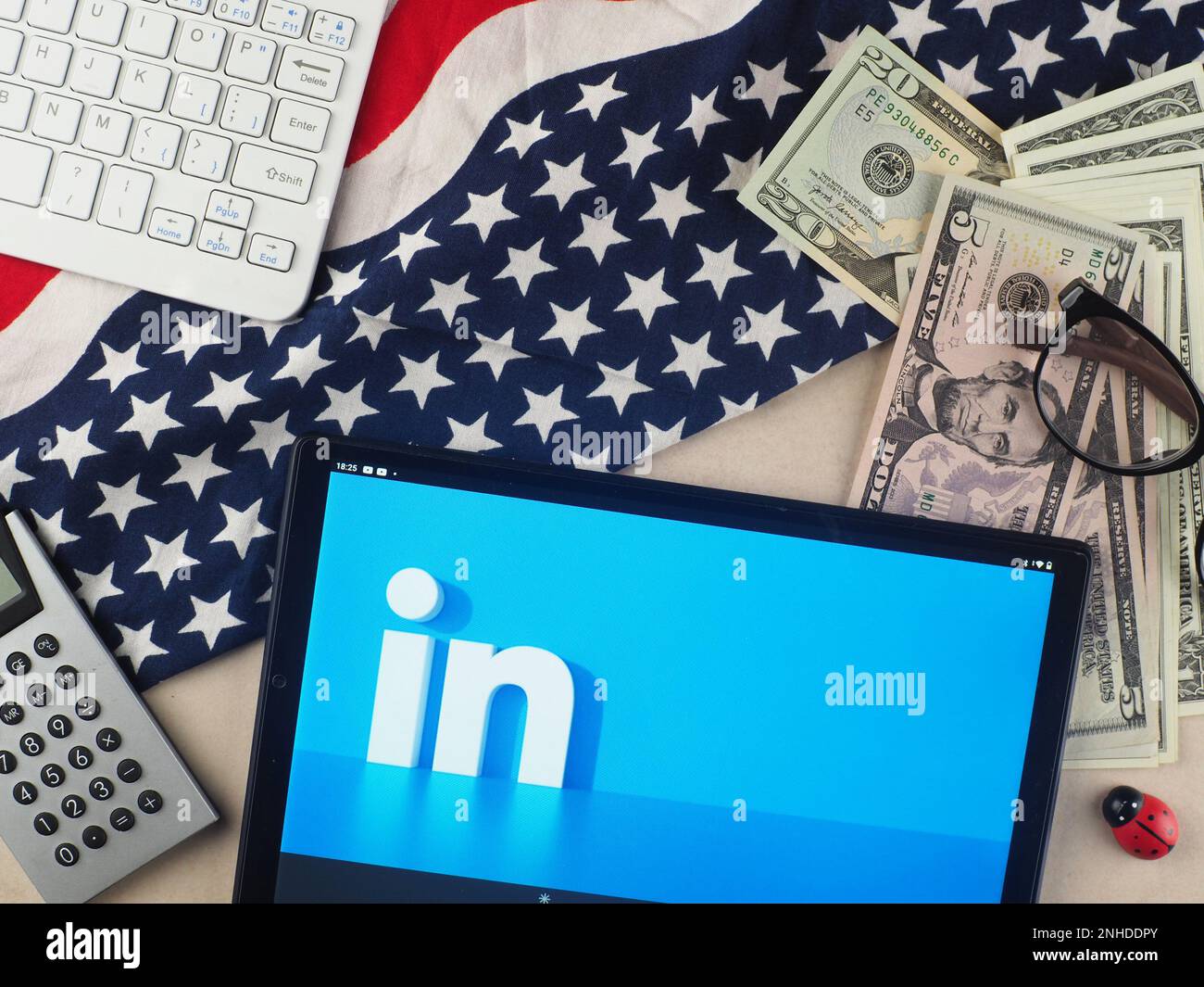 In this photo illustration, LinkedIn logo seen displayed on a tablet ...