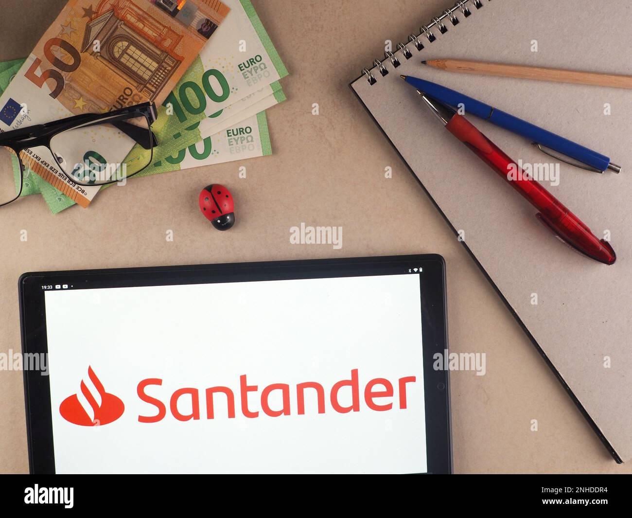 In this photo illustration, Santander Group logo seen displayed on a ...