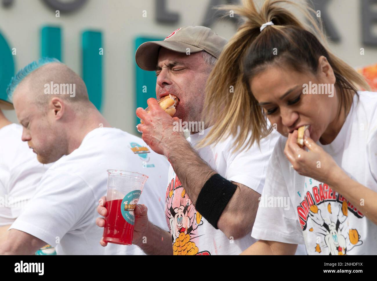 Geoffrey Esper, center, competes with Nick Wehry, left, and Miki Sudo ...