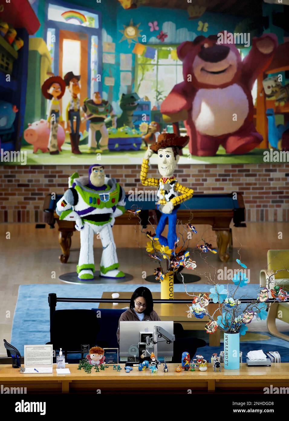 Receptionist, Kris Javier, on Tuesday June 8, 2010, is surrounded by ...