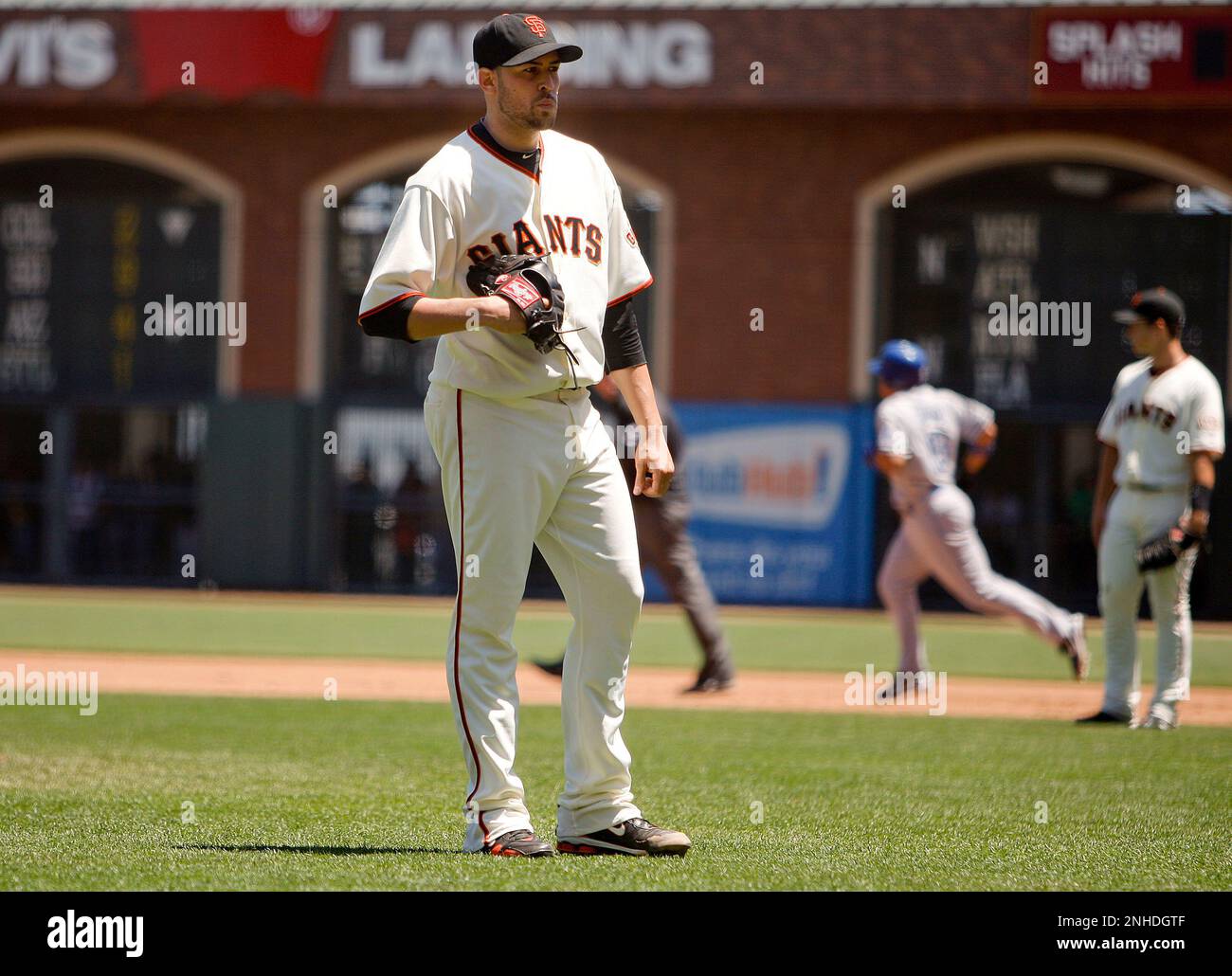 Giants starting pitcher Jonathan Sanchez gives up a two-run home run to ...