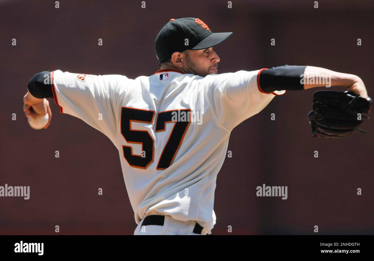 Giants starting pitcher Jonathan Sanchez throws in the first inning as ...