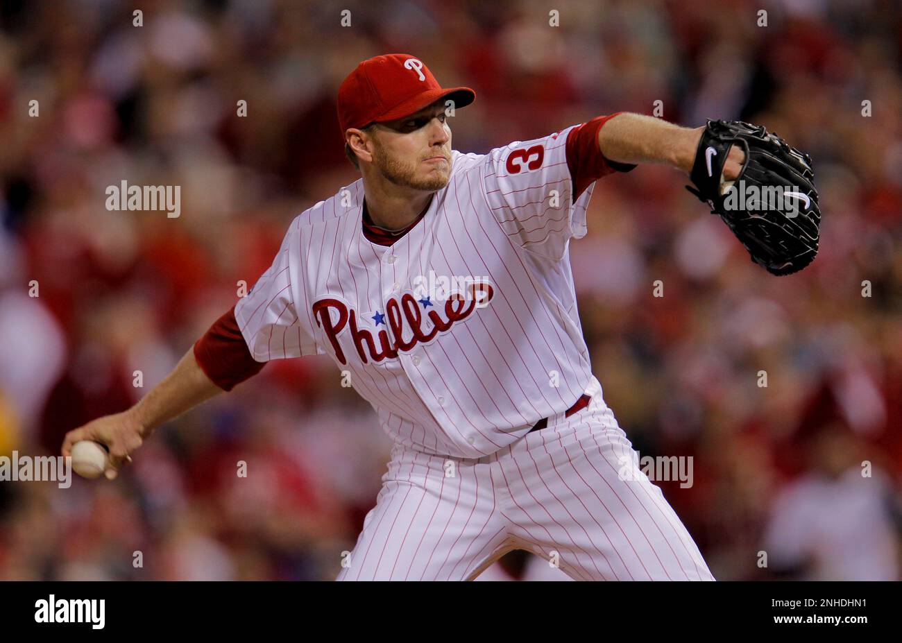 Phillies starting pitcher Roy Halladay throws in the first inning of ...
