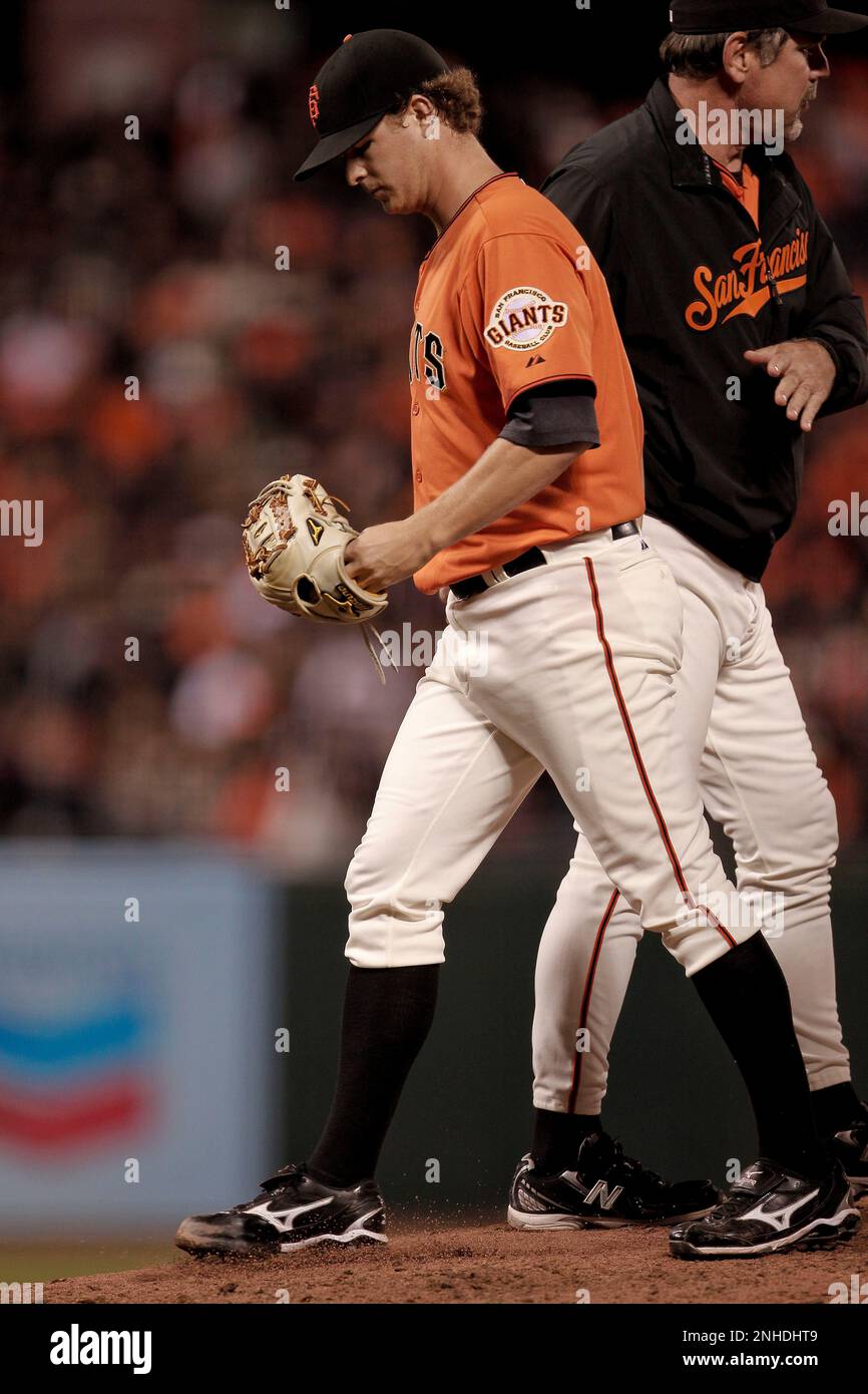 Giants starting pitcher Matt Cain leaves in the fifth inning with the ...