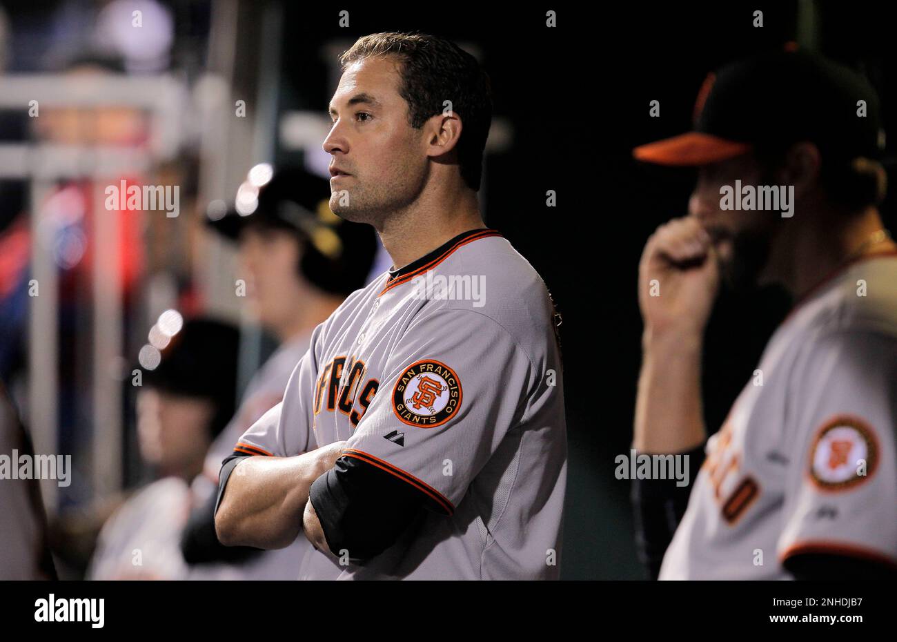 Giants Pat Burrell watches as the last out is made to end the game, as ...
