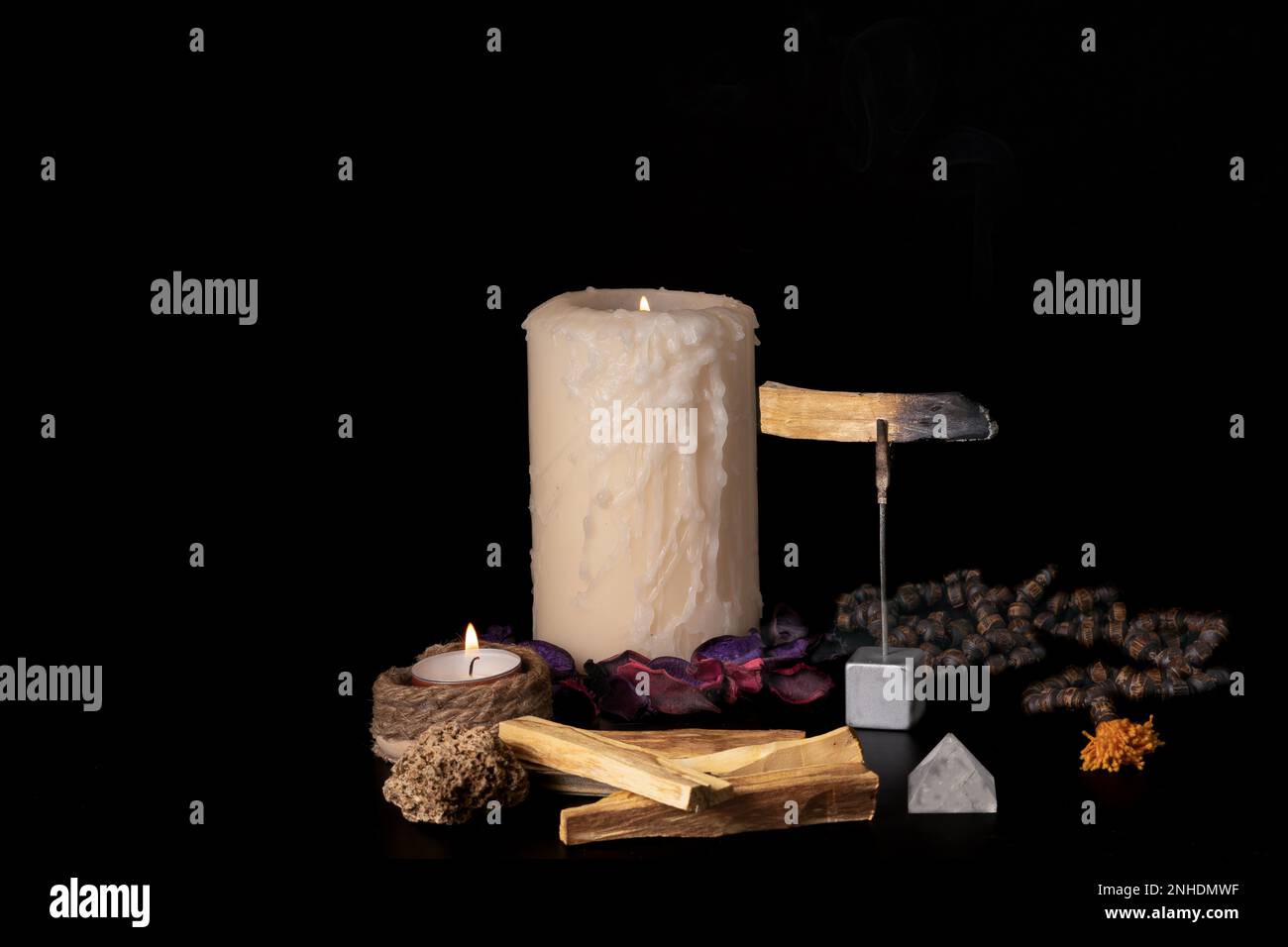 Zen image of smoking palo santo, holy stick with candles and japa-mala ...