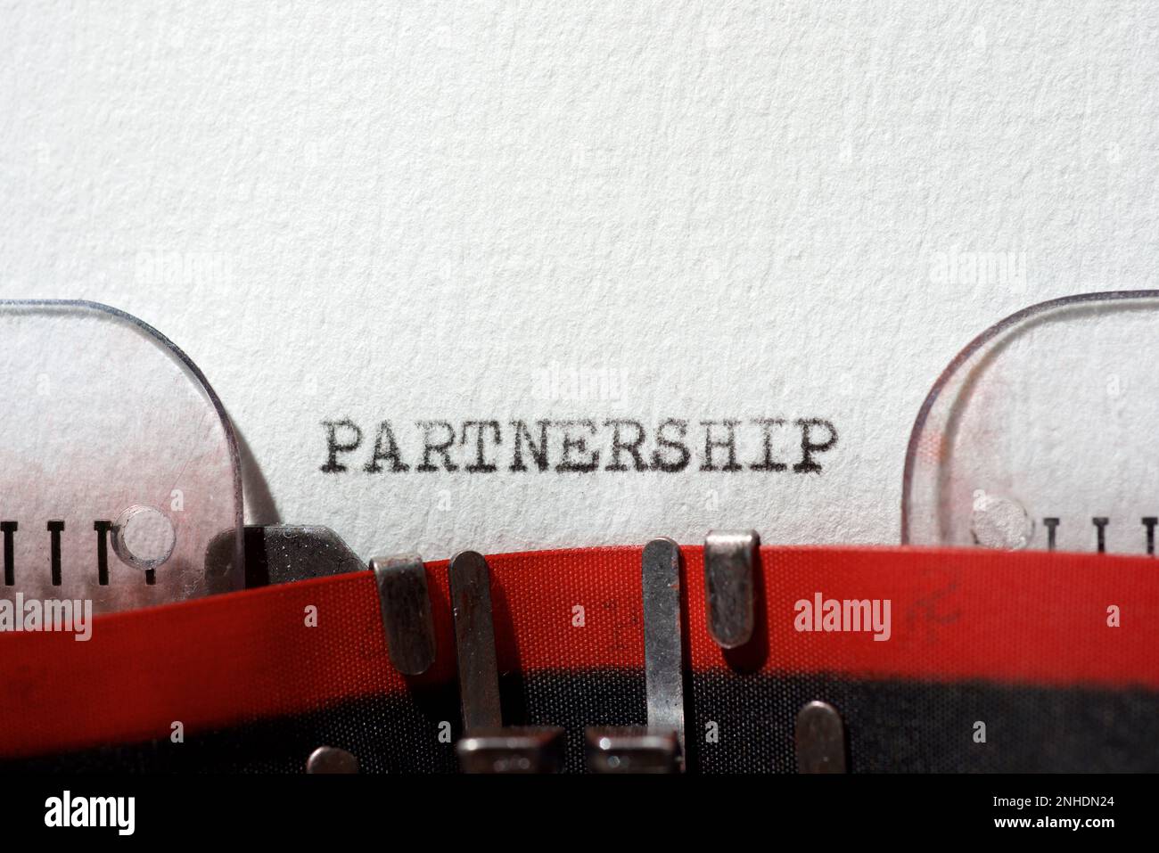 Partnership word written with a typewriter Stock Photo - Alamy