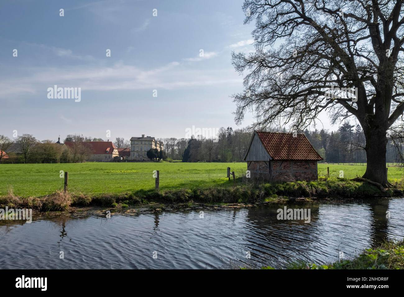Muensterische Aa with historic bakehouse and in the background moated ...