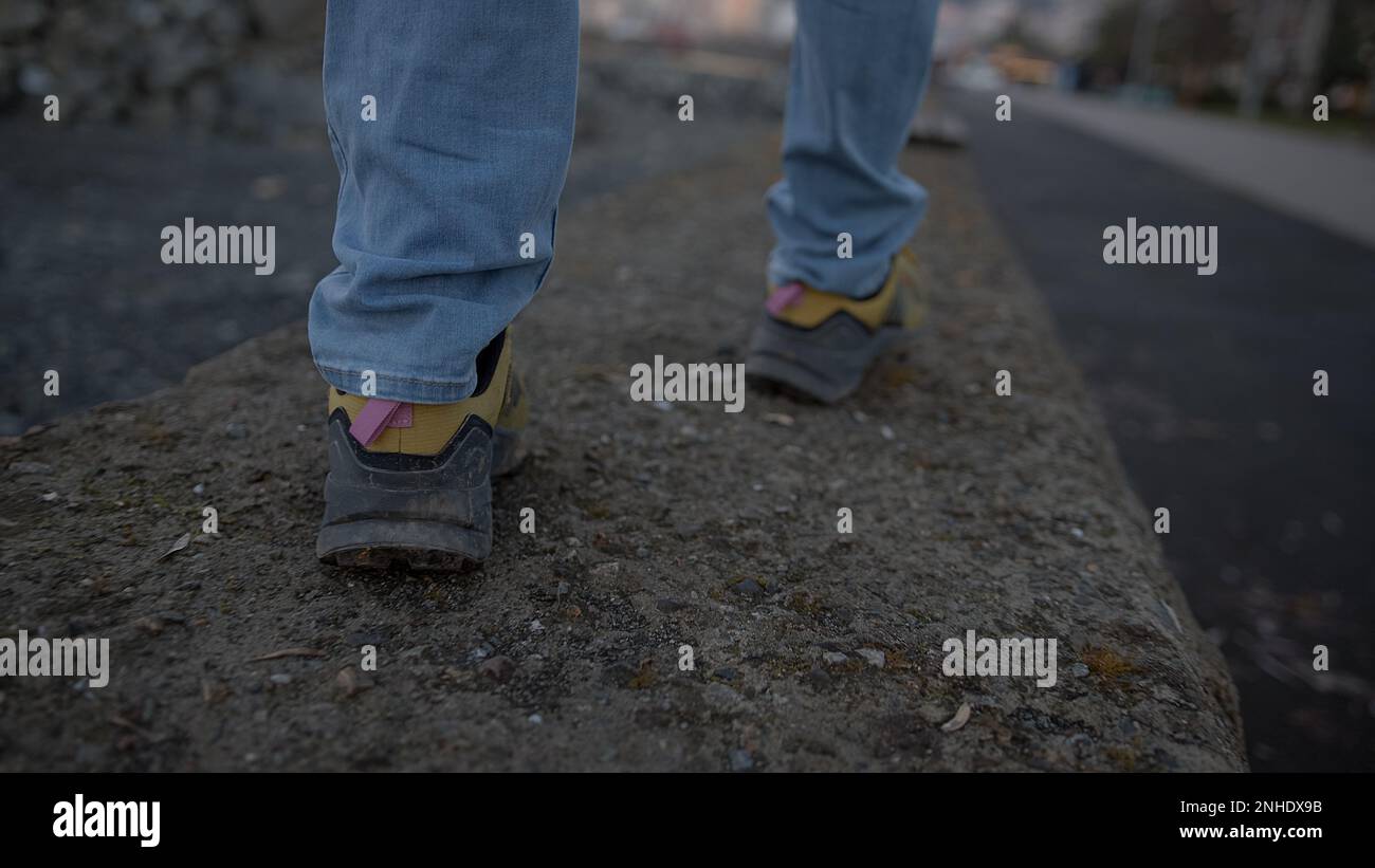 Feet Walking Down A Path