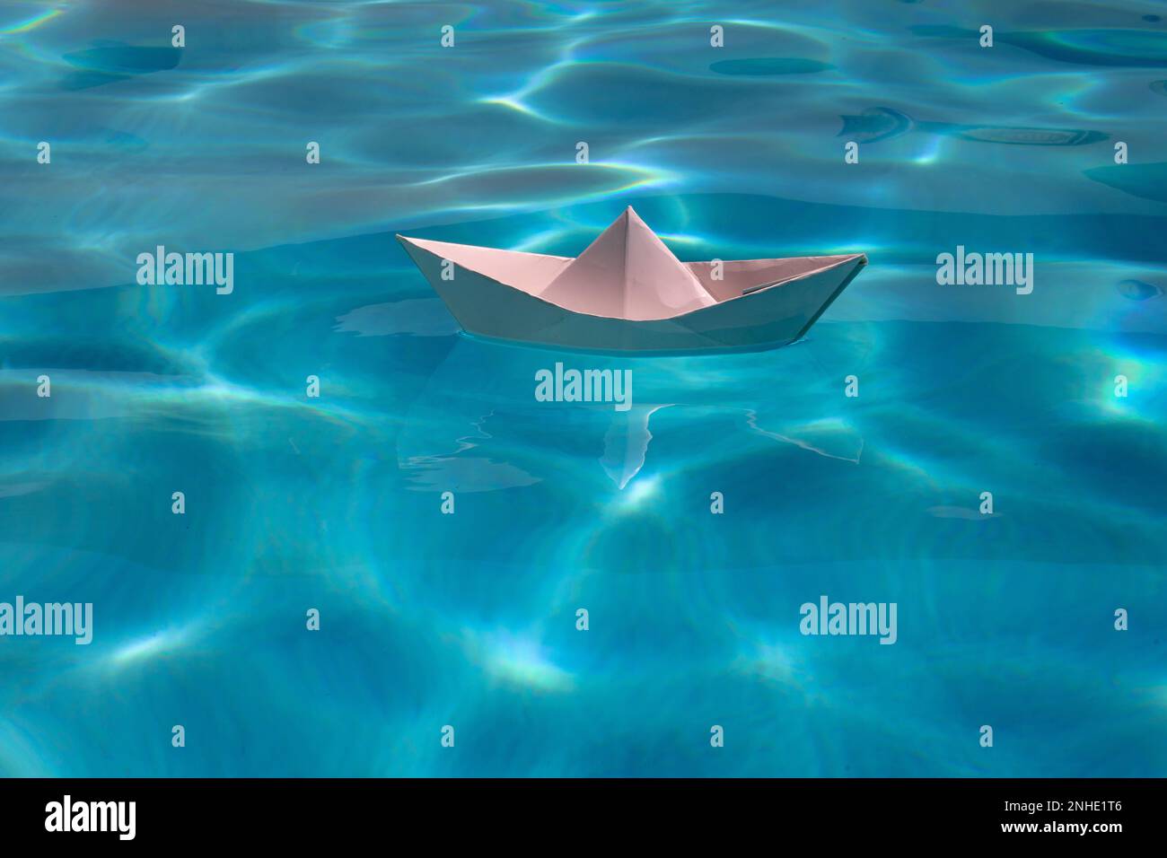 Sailing yacht concept, paper ship with sailing boat. Paper boat on the ...