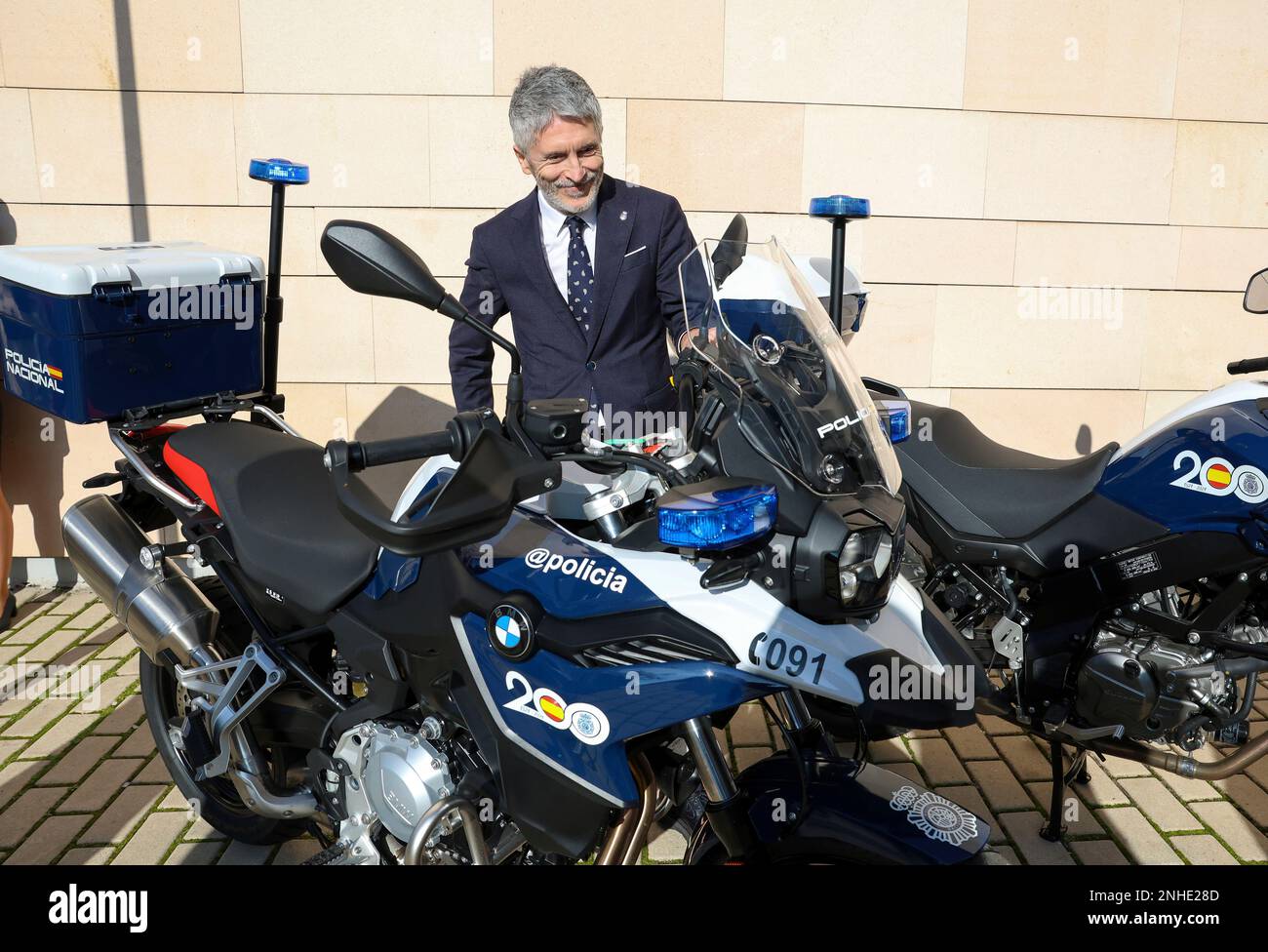 The Minister of the Interior, Fernando Grande-Marlaska, poses next to ...