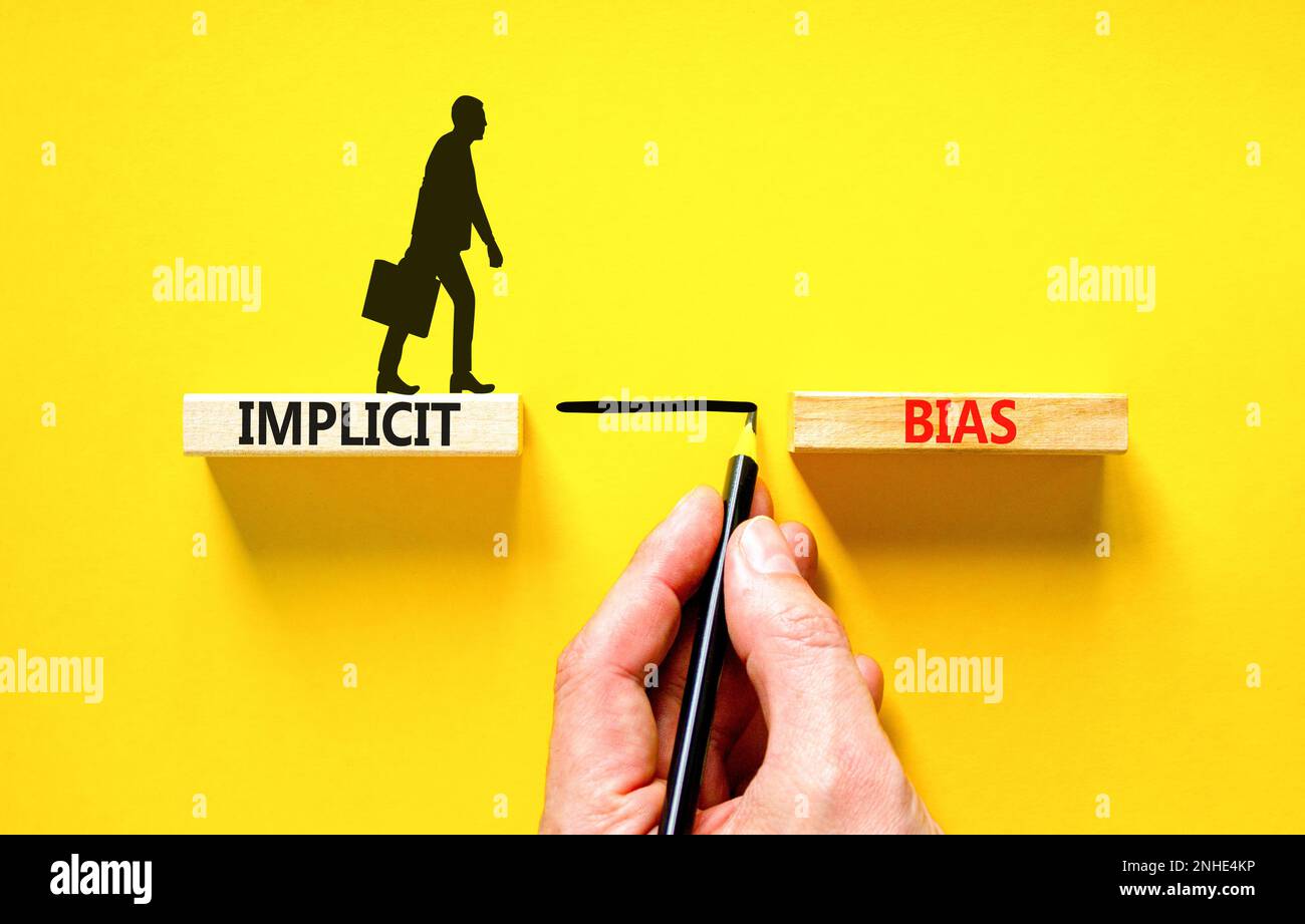 Implicit bias symbol. Concept words Implicit bias on wooden block ...