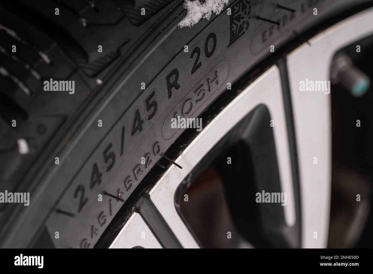 Close up view of tire with tire width, height and wheel diameter ...