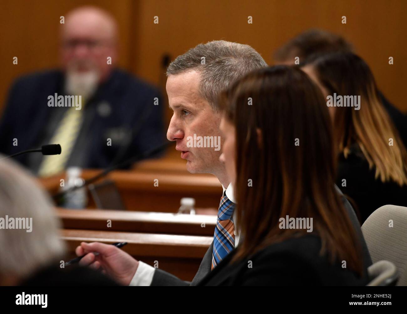 Mark Jensen's attorney Jeremy Perri, center, questions Dr. Michael ...