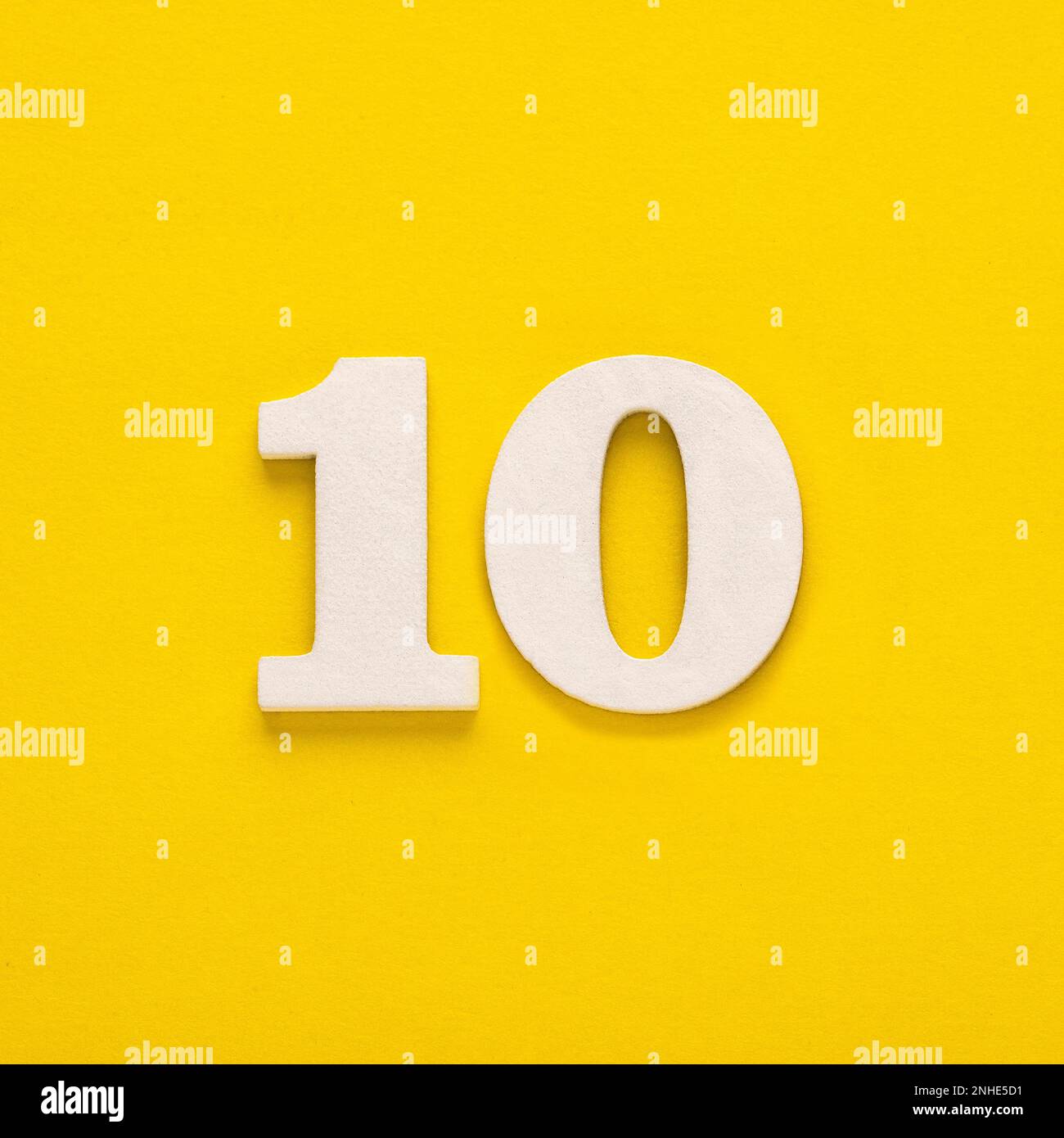 Number 10 on a yellow background - Two-digit number in white Stock ...