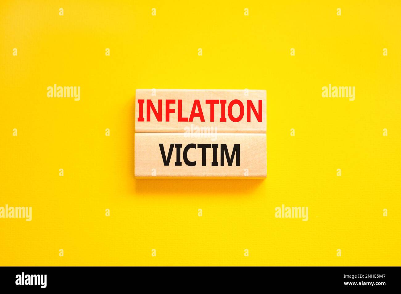 Inflation victim symbol. Concept words Inflation victim on wooden block ...